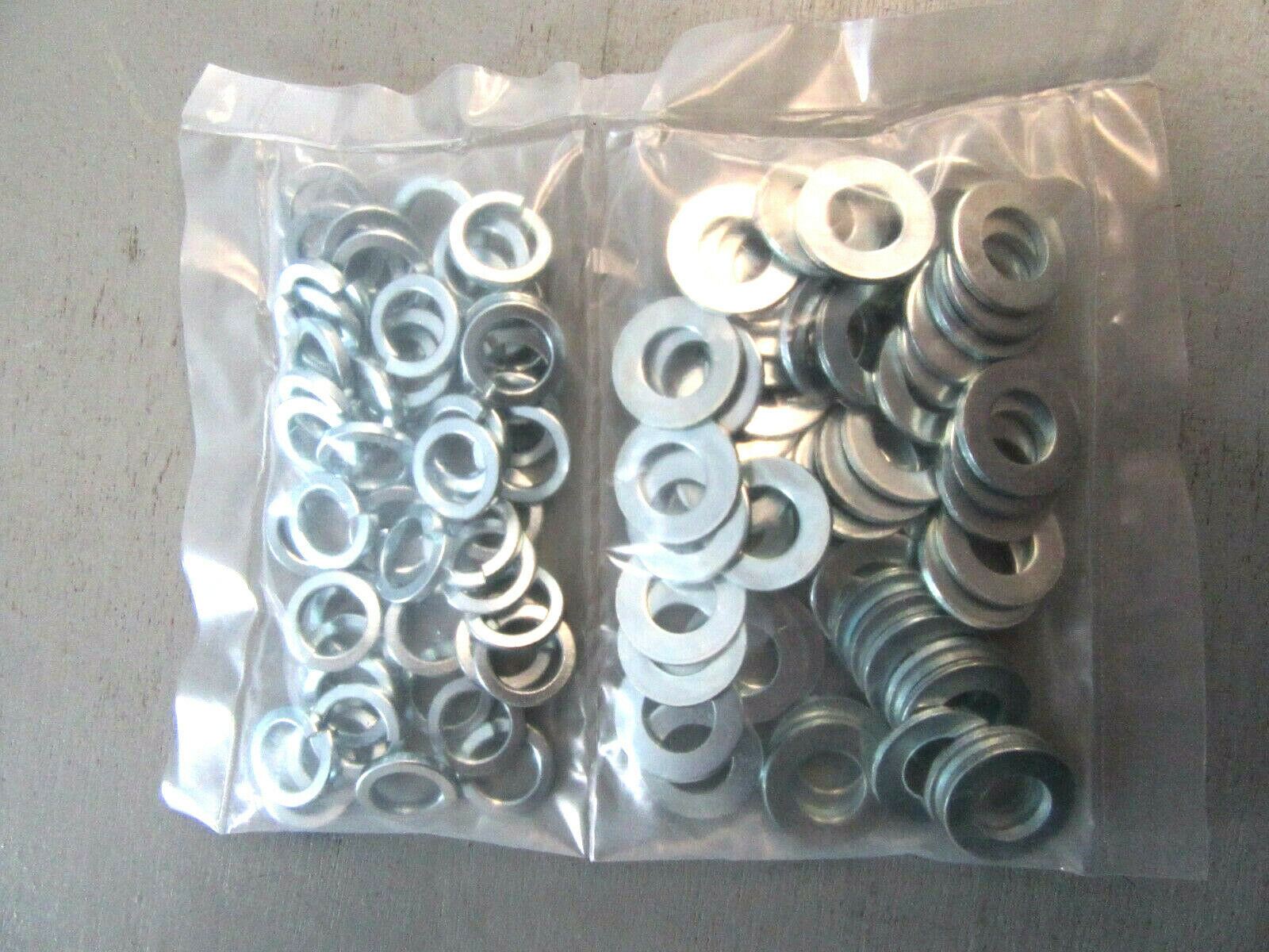 Pack 100 M16 and 16mm flat form A thick washers and spring splitlock w